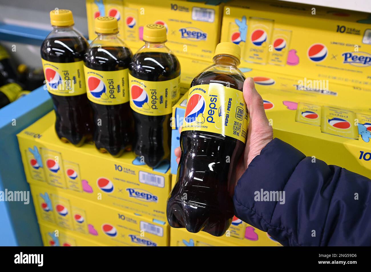 New York, USA. 17th Feb, 2023. A woman holds a plastic bottle of ...