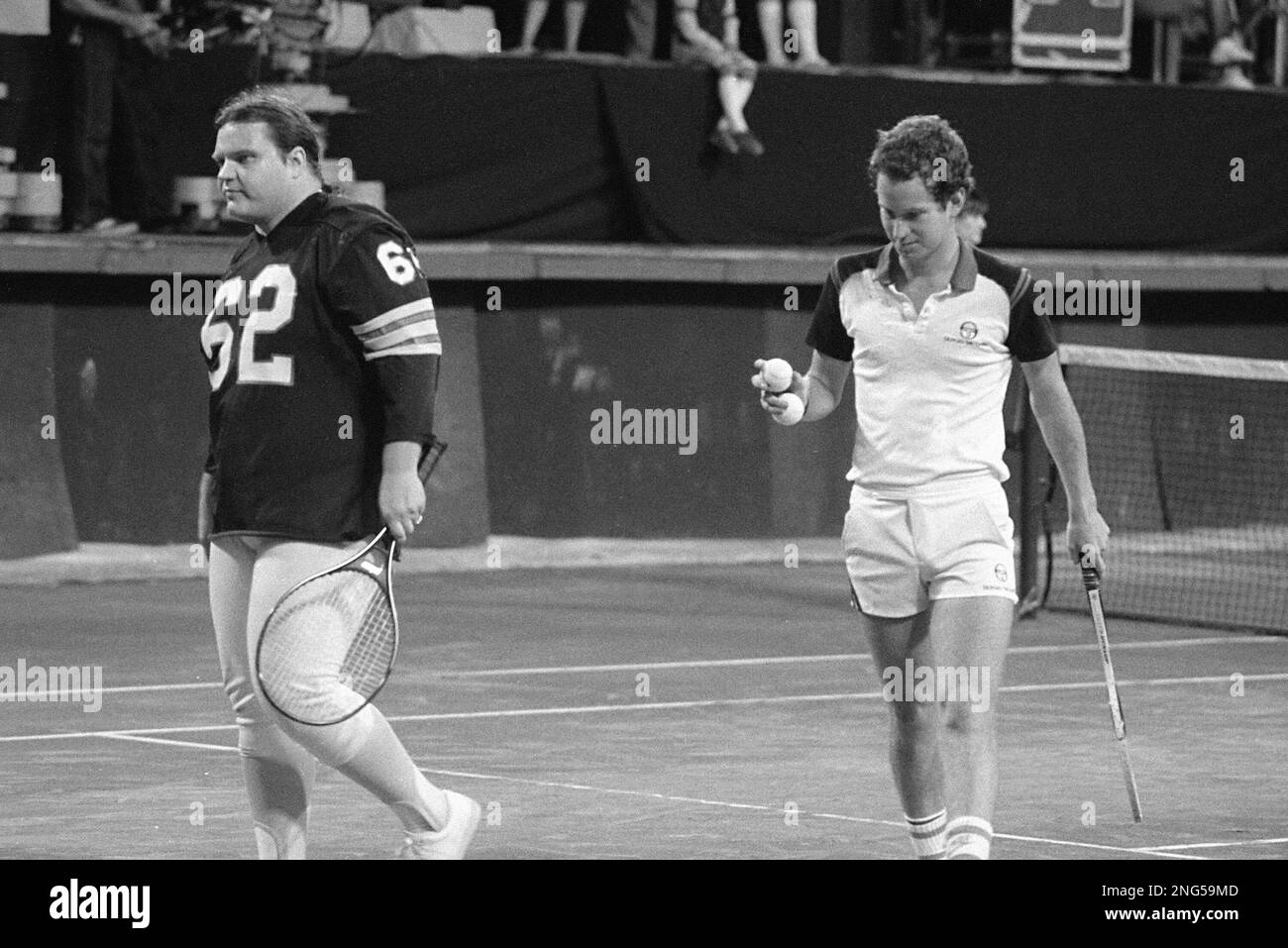 Rock star Meat Loaf, left, and tennis star John McEnroe are seen during ...
