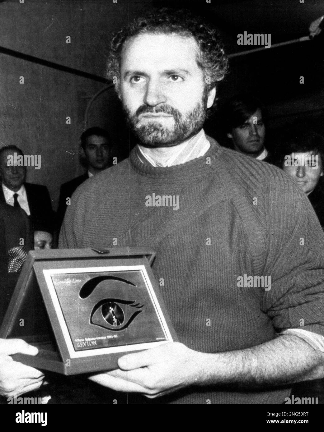 Italian fashion designer Gianni Versace is awarded the "Golden Eye ...