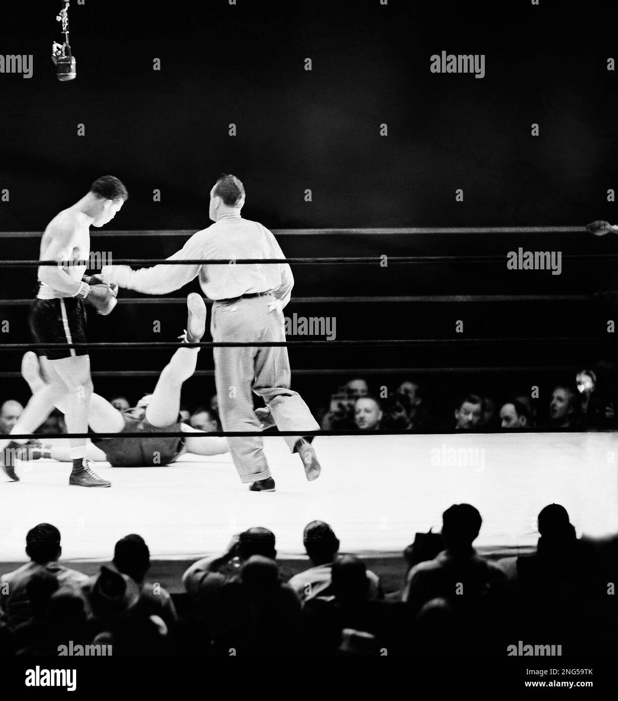 Joe Louis, the Brown Bomber, just after he floored Tony Galento with a ...