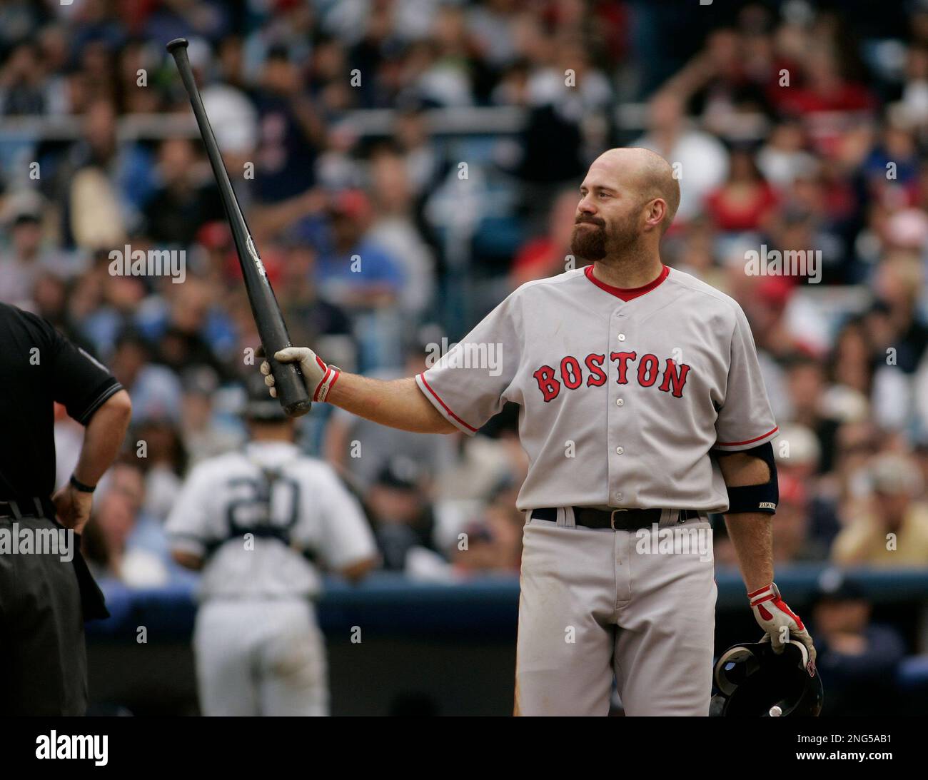 Boston Red Sox's Kevin Youlikis walks off the field after striking out ...