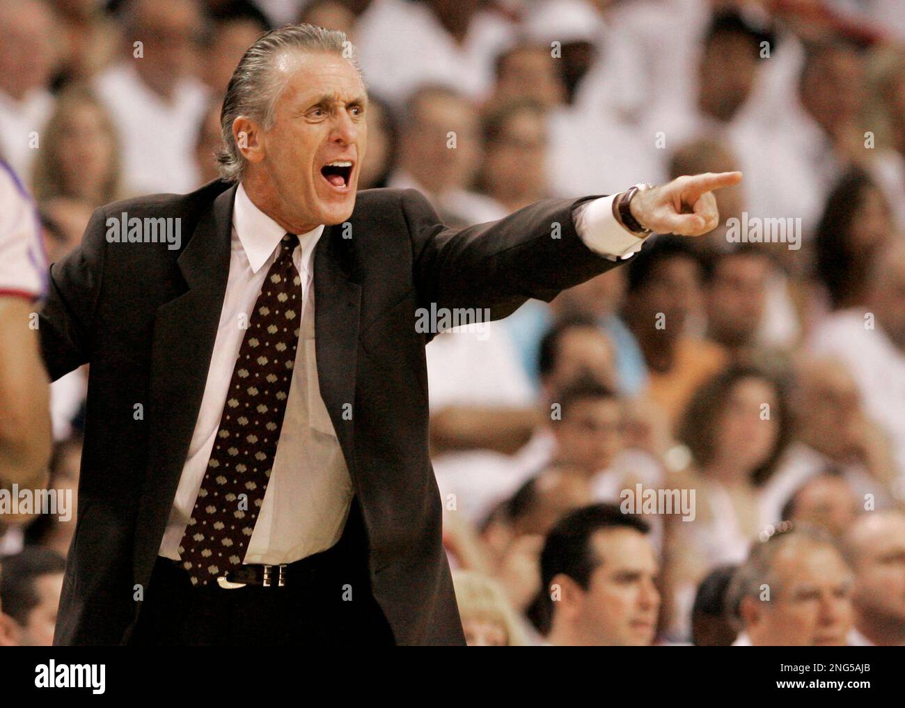 Miami Heat coach Pat Riley yells instructions to his team in a ...