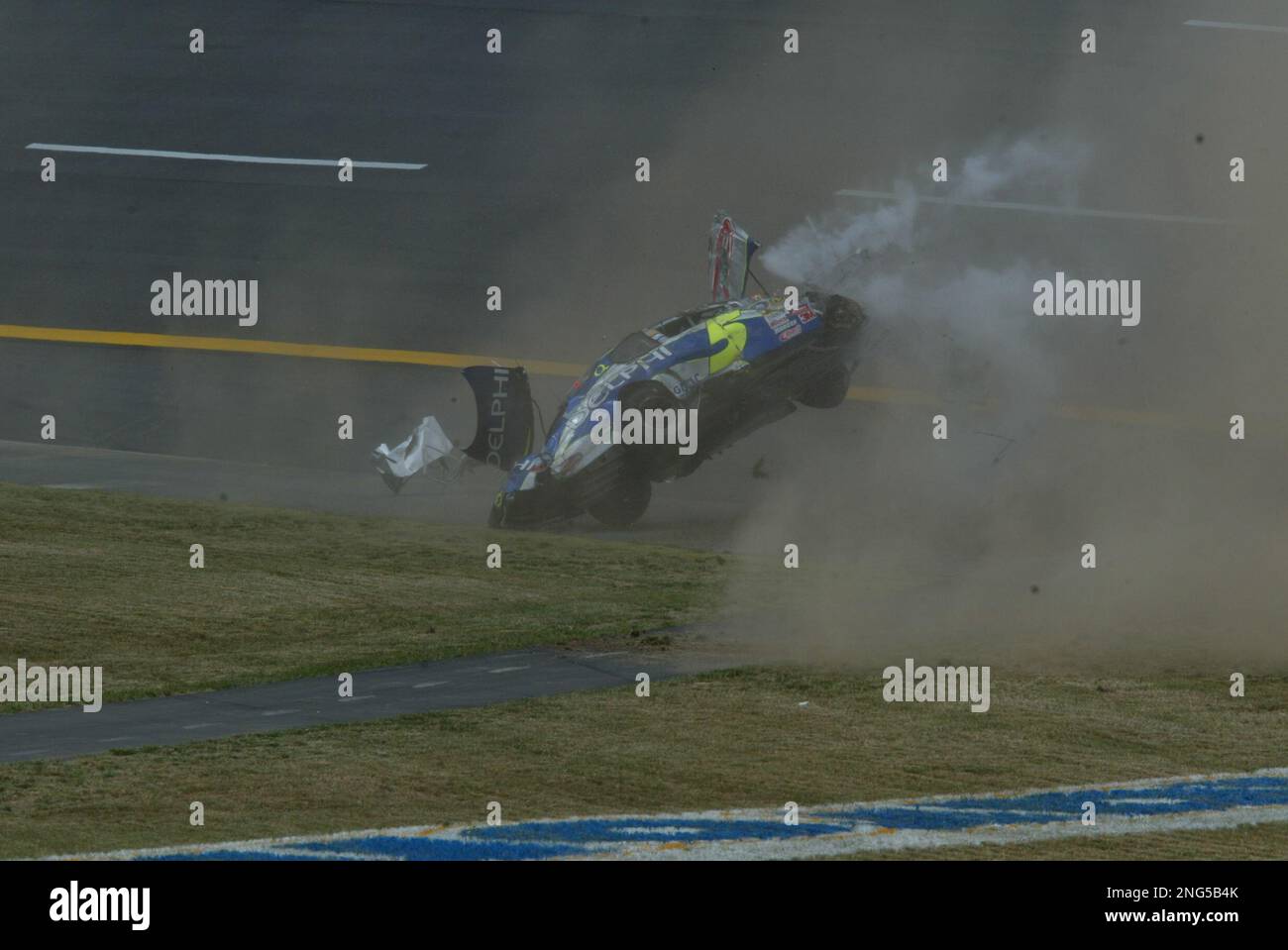 Driver Kyle Busch (5) wrecks on the back stretch during the 27th lap of ...
