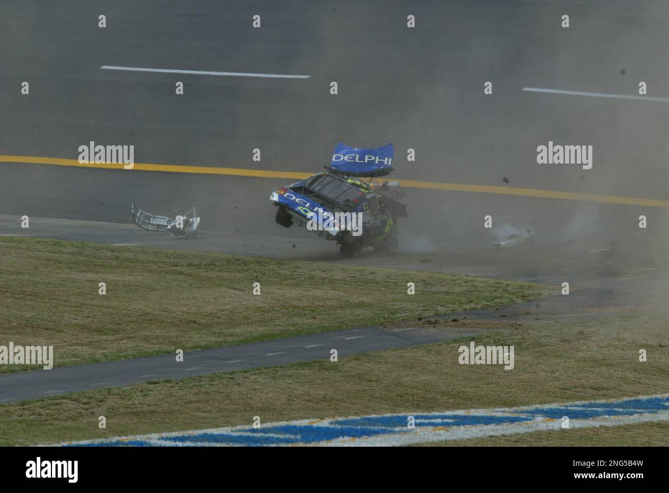 Driver Kyle Busch (5) wrecks on the back stretch during the 27th lap of ...
