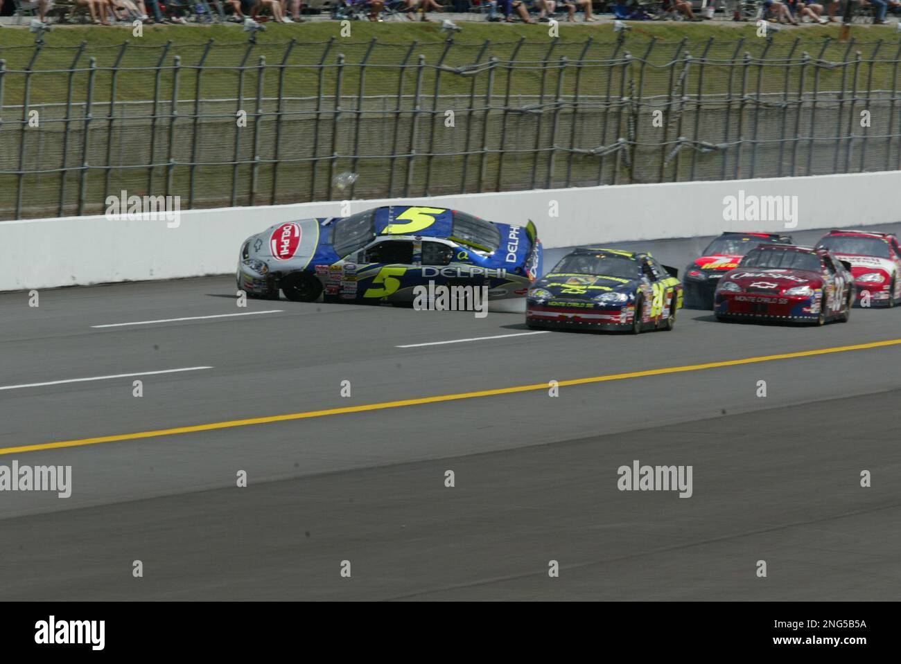 Driver Kyle Busch (5) wrecks on the back stretch during the 27th lap of ...