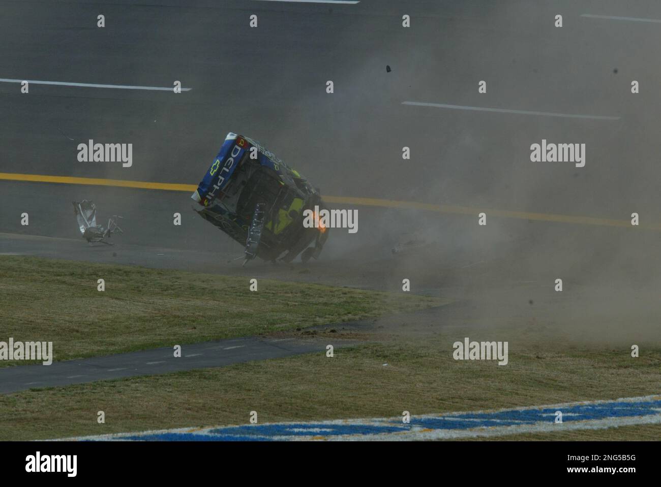 Driver Kyle Busch (5) wrecks on the back stretch during the 27th lap of ...