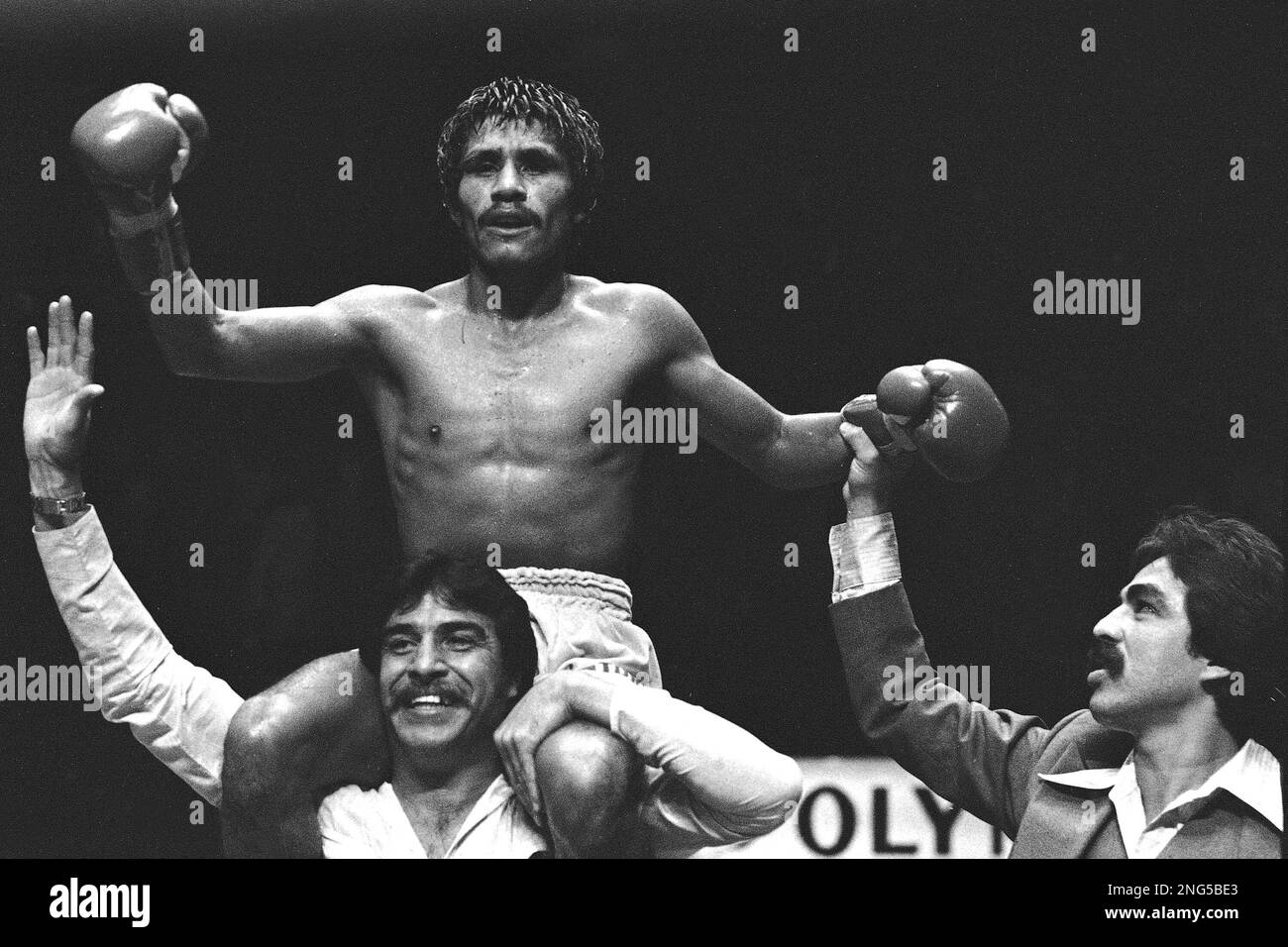 W.B.C. bantamweight champion, Mexican boxer Lupe Pintor, celebrates his ...
