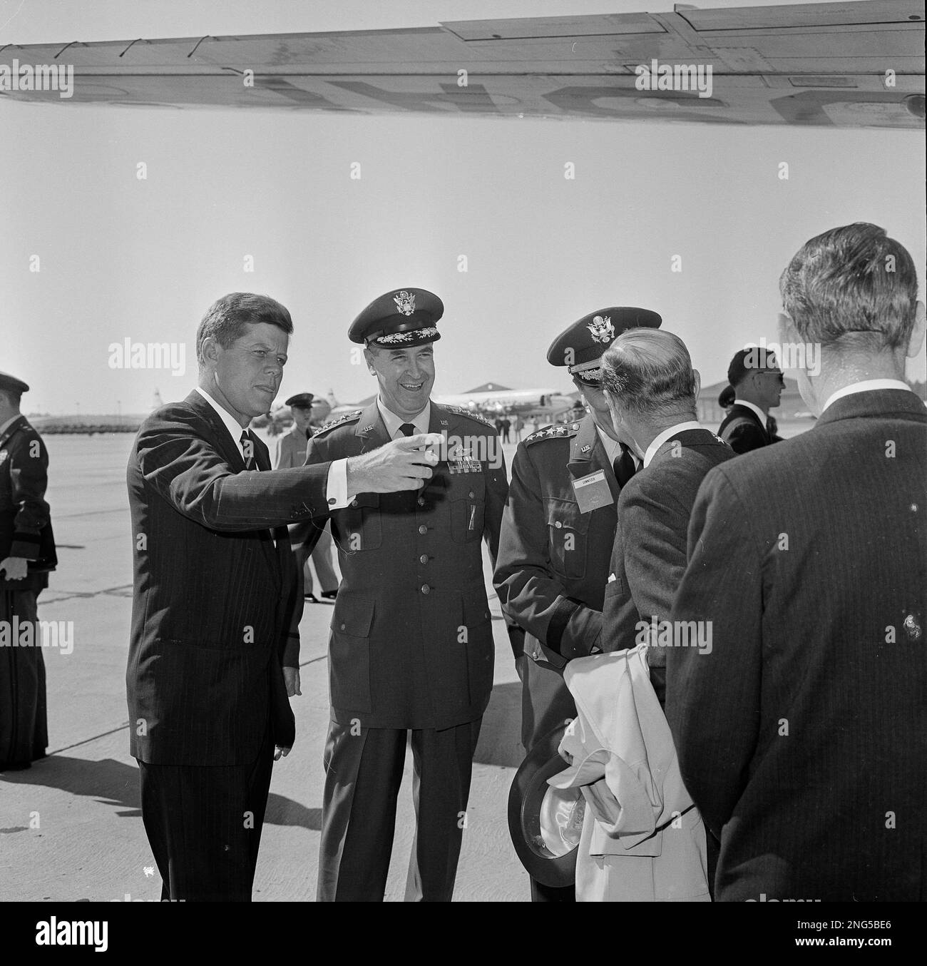 President John F. Kennedy is seen with Gen. Lyman Lemnitzer of the Army ...