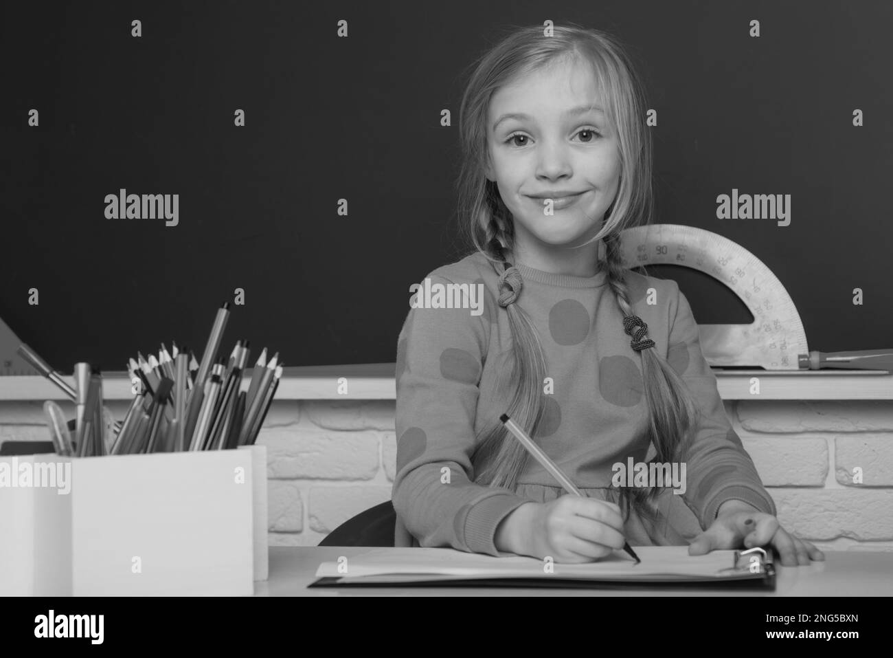 Schoolgirl schoolkid Black and White Stock Photos & Images - Alamy