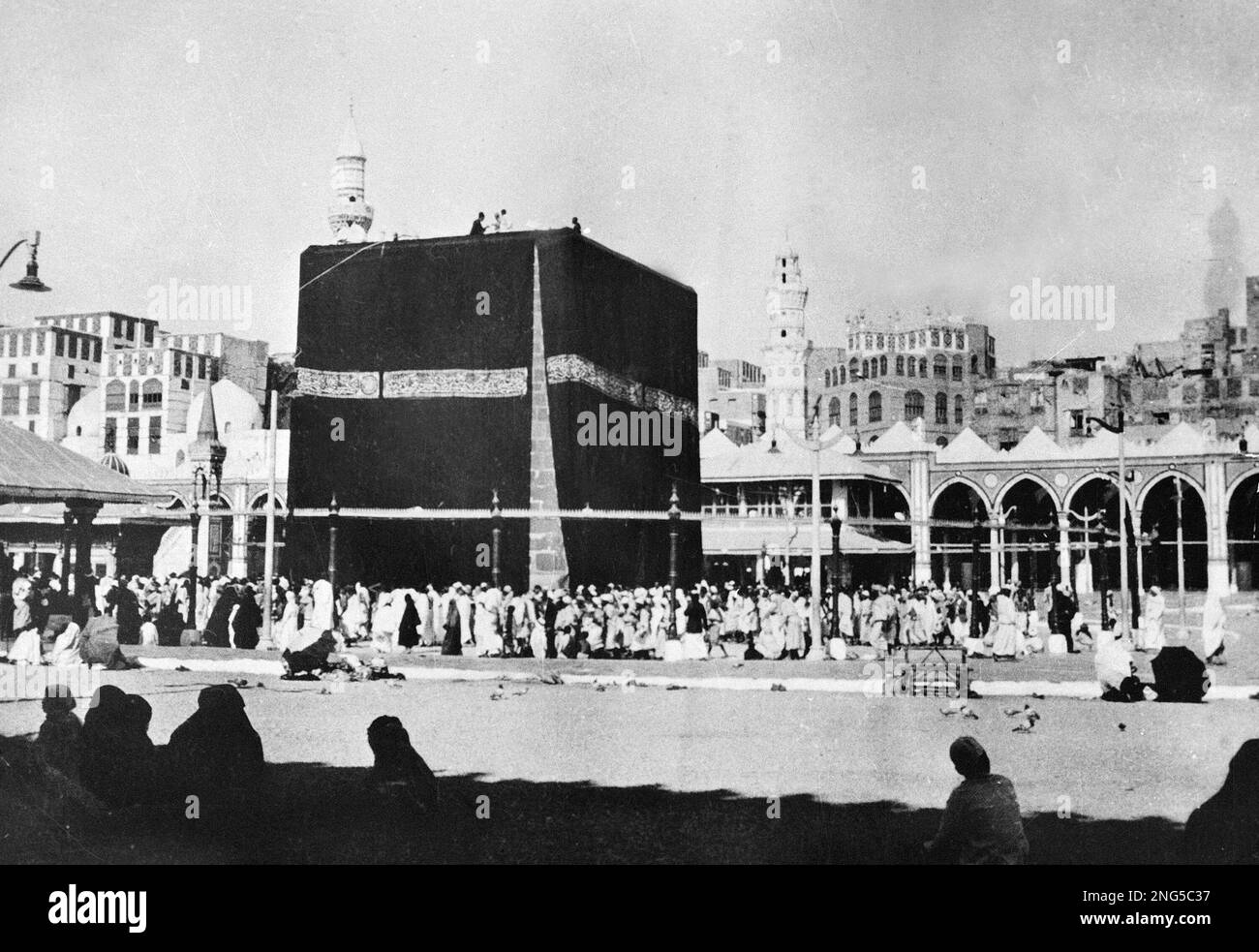 The Kaaba in Mecca, Saudi Arabia, an ancient stone building covered in ...