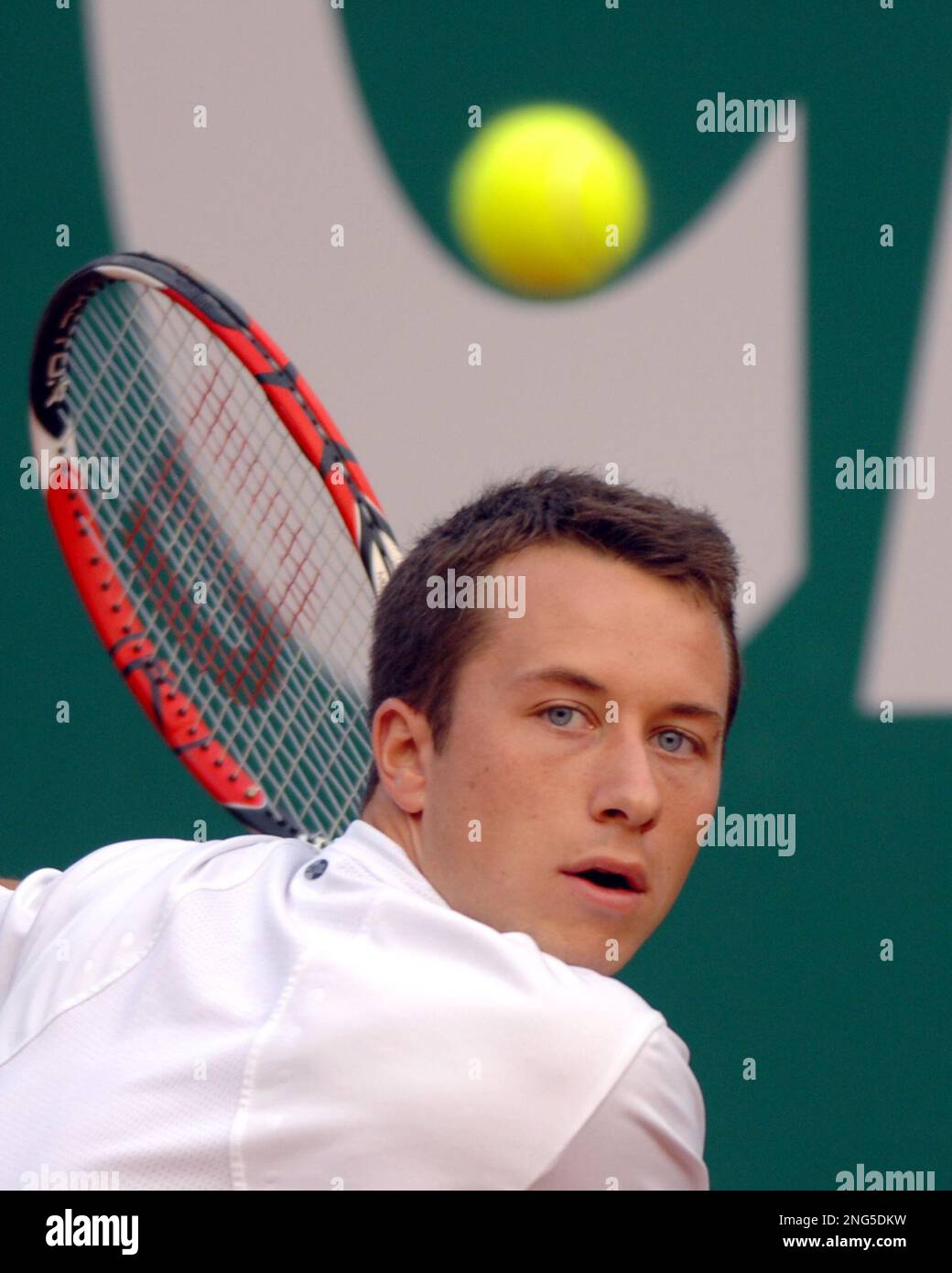 Philipp Kohlschreiber of Germany returns to Rafael Nadal of Spain ...