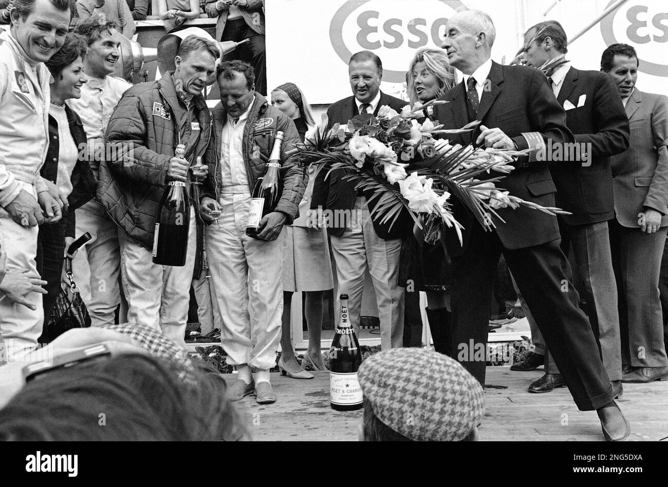 Henry Ford III and his wife Rurh, left, watch as driver Dan Gurney ...