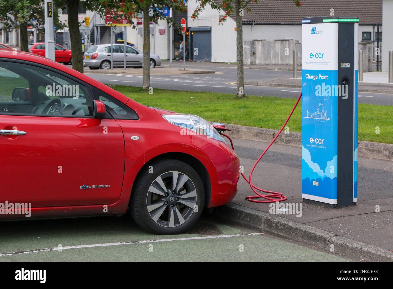 Red nissan charging hi-res stock photography and images - Alamy