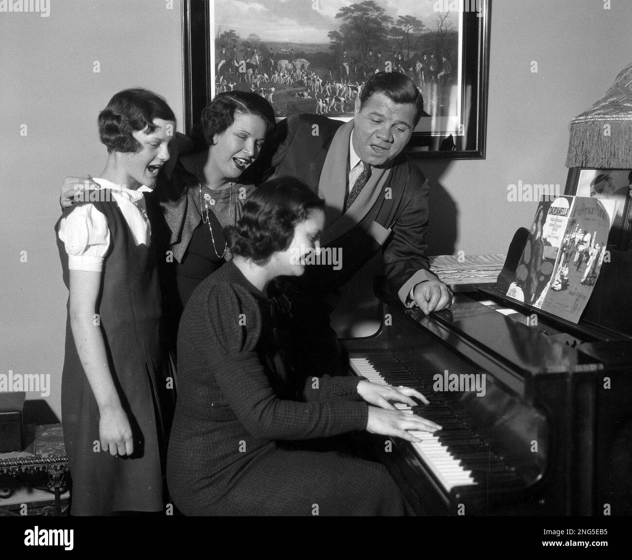 Babe Ruth and his family celebrate his 40th birthday at their home in ...