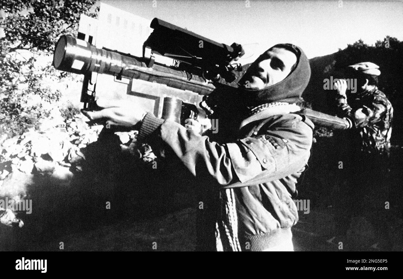 An afghan Guerrilla handles a U.S.-made singer anti-aircraft missile in ...