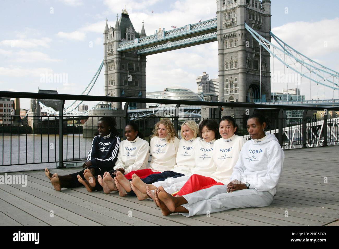 Marathon runners, from left, Lornah Kiplagat of Netherlands, Geta Wami ...