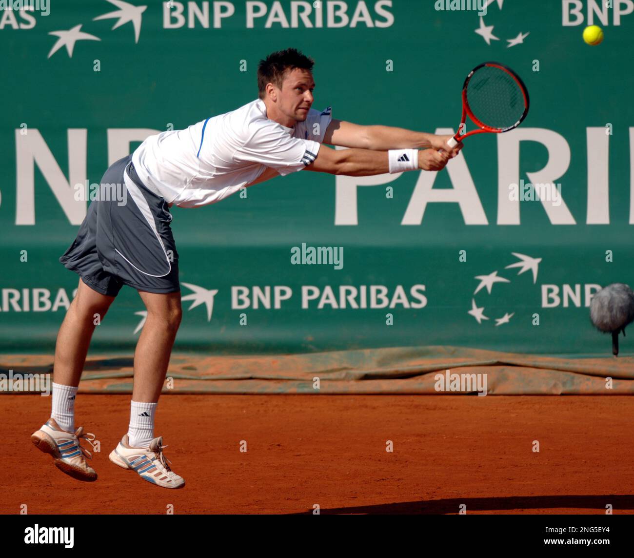 Robin Soderling of Sweden returns the ball to Nikolay Davydenko of ...