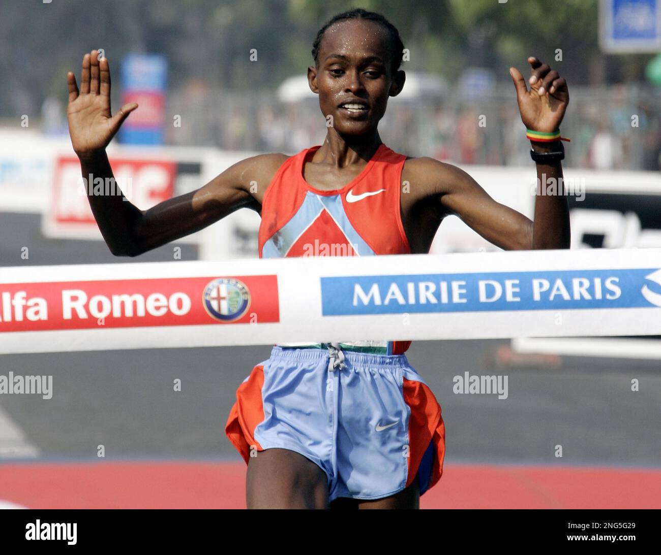 Tafa Magarsa of Ethiopia crosses the finish line to win the women's ...