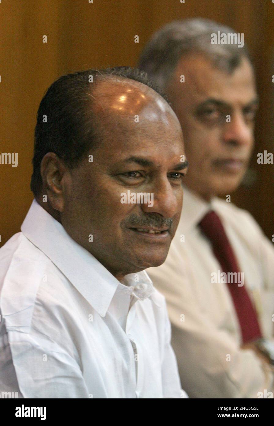 Indian Defense Minister A. K. Antony, foreground, speaks during a press ...