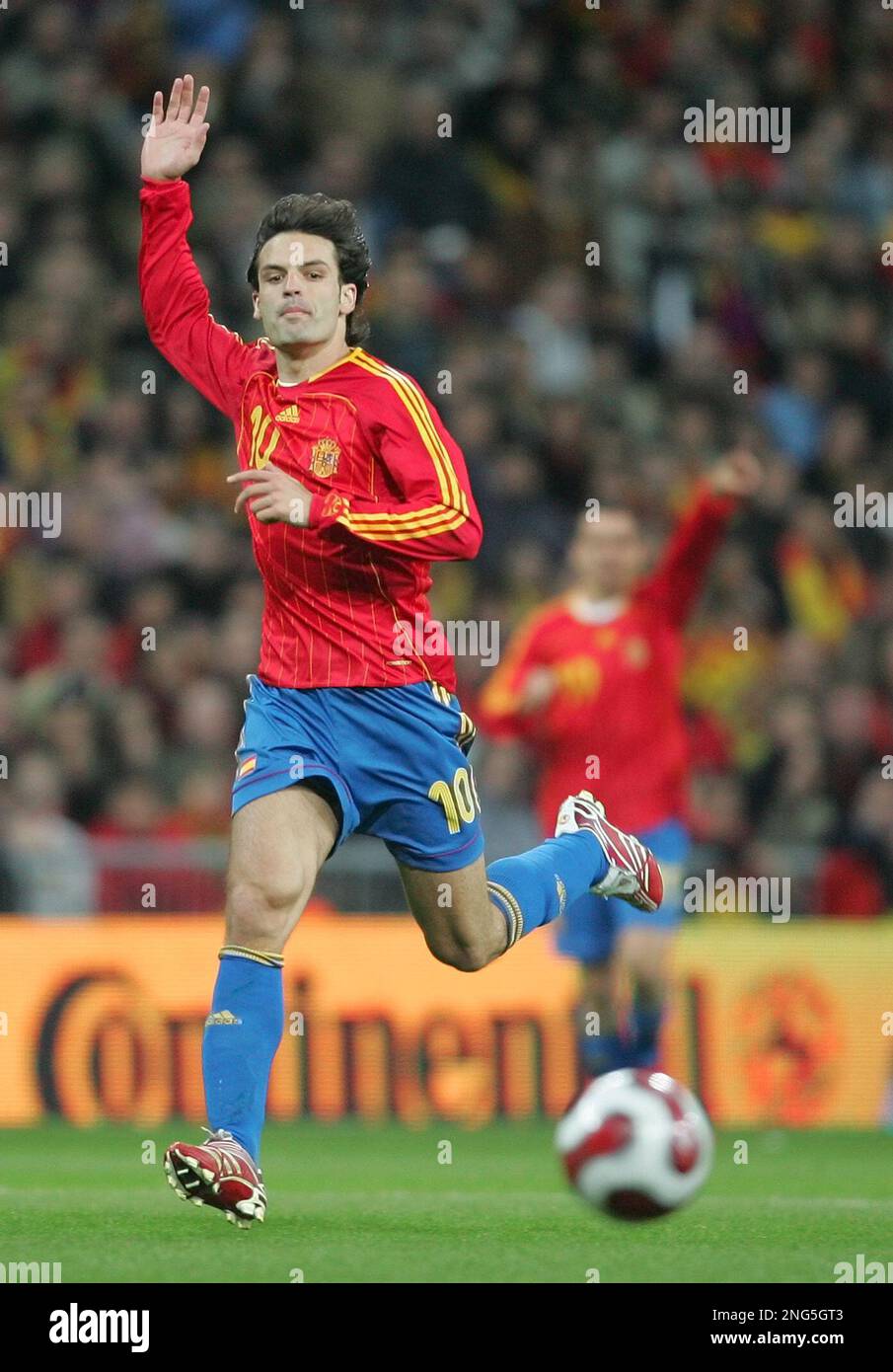 Spanish national player Fernando Morientes looks the ball against ...