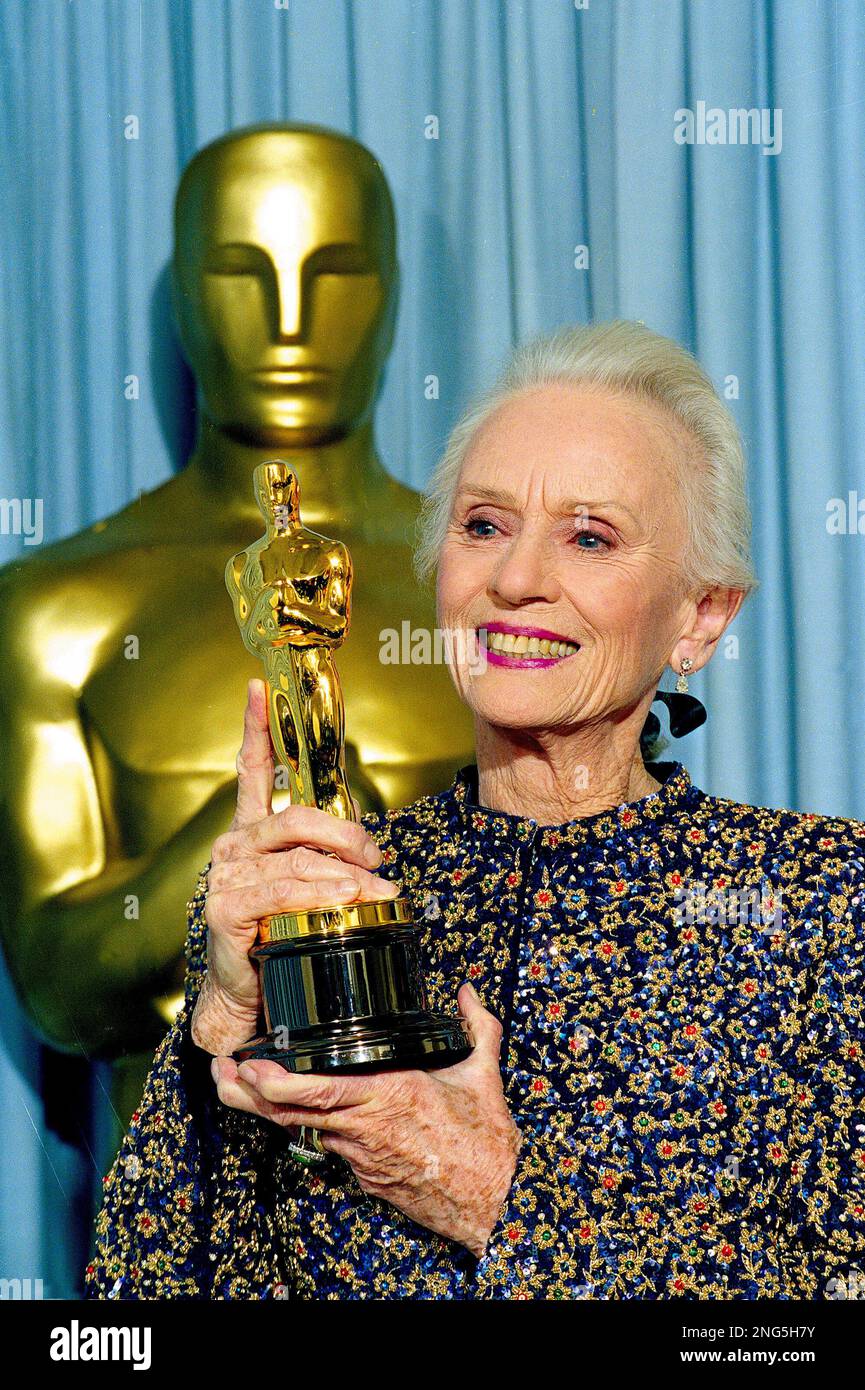 Actress Jessica Tandy holds up the Oscar she won for her role in ...