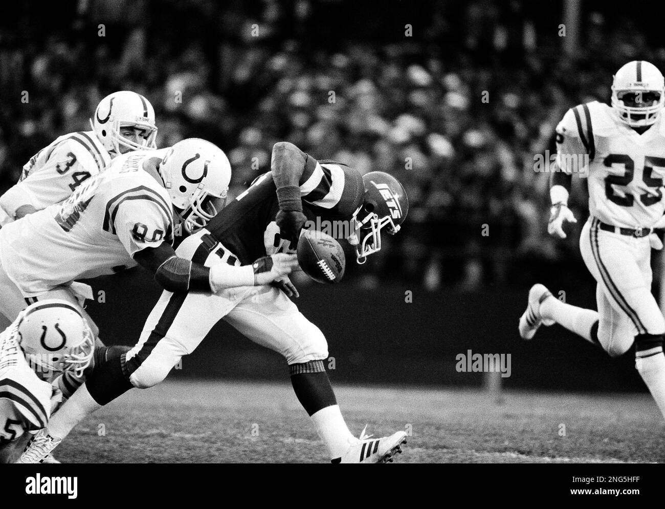 Baltimore Colts' Johnie Cooks gets his hand in to force a fumble by New ...