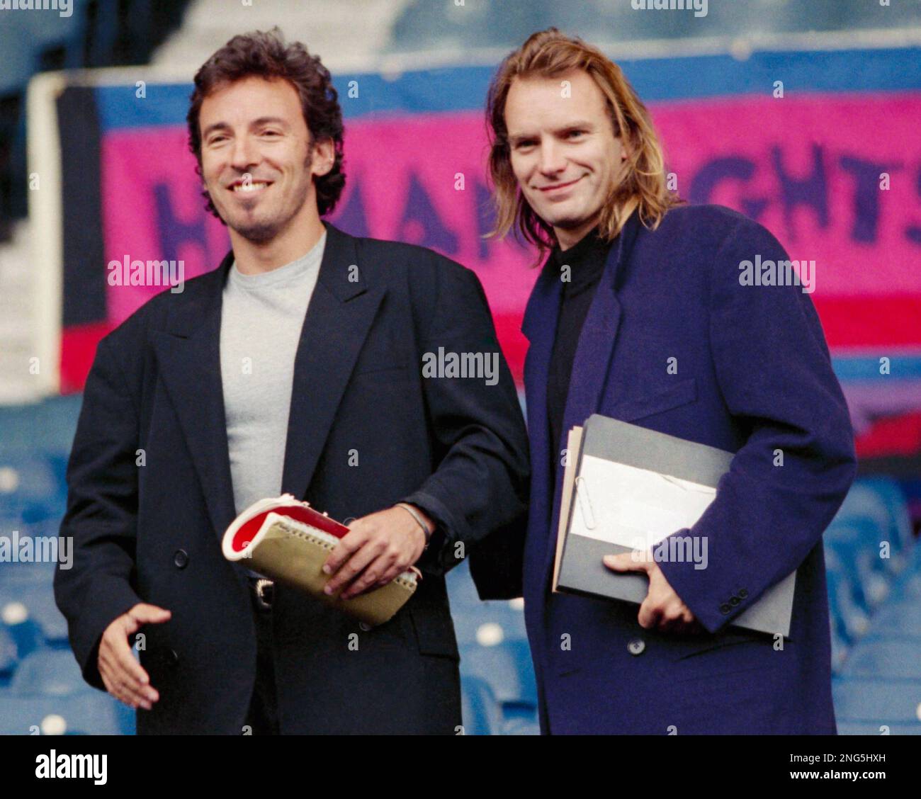 Pop stars Bruce Springsteen and Sting , right are shown at London's ...