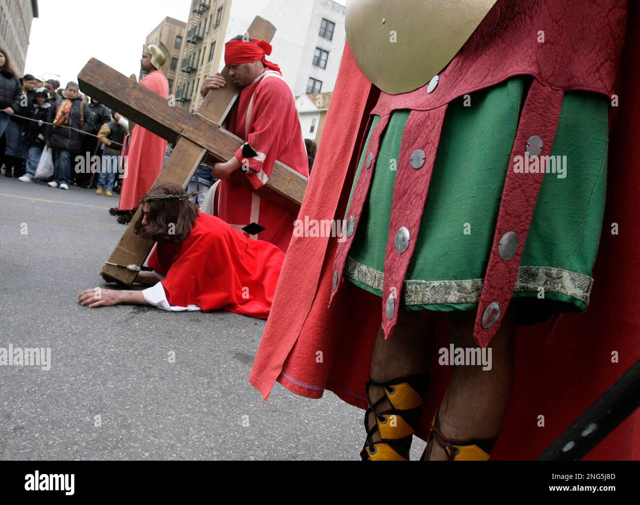 Jesus Christ, played by Rafael N. Gonzalez, falls to the ground during ...