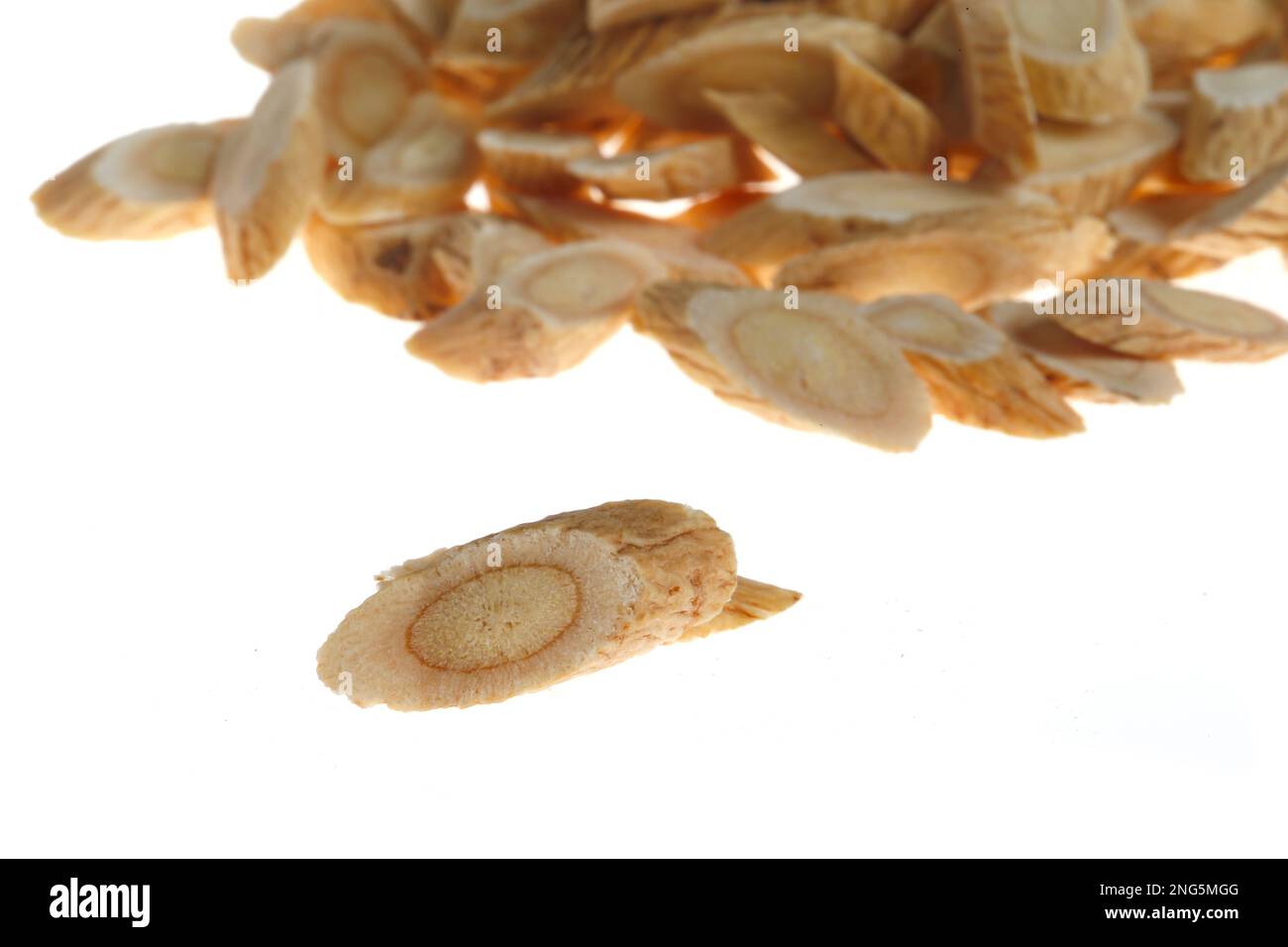 Chinese herbal medicine astragalus membranaceus on a white background ...
