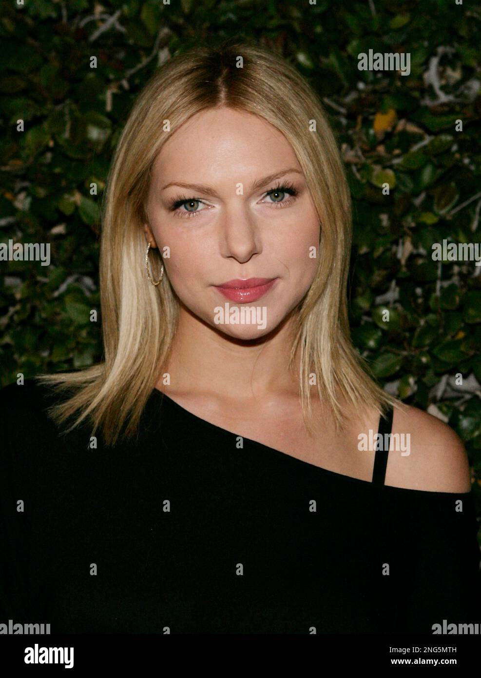 Laura Prepon poses at the DETAILS magazine party presented by Emporio ...