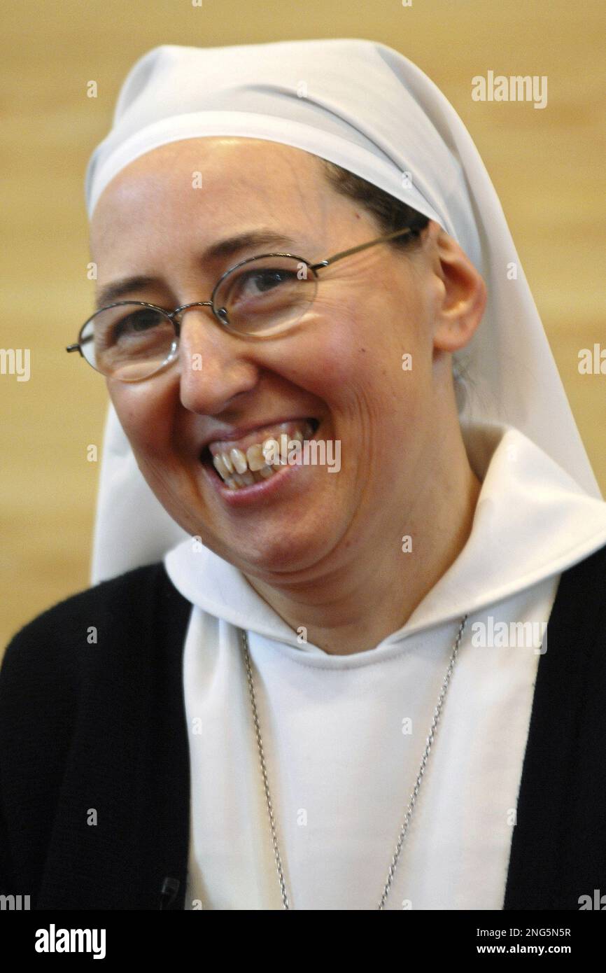 French nun Sister Marie-Simon-Pierre smiles during a press conference ...