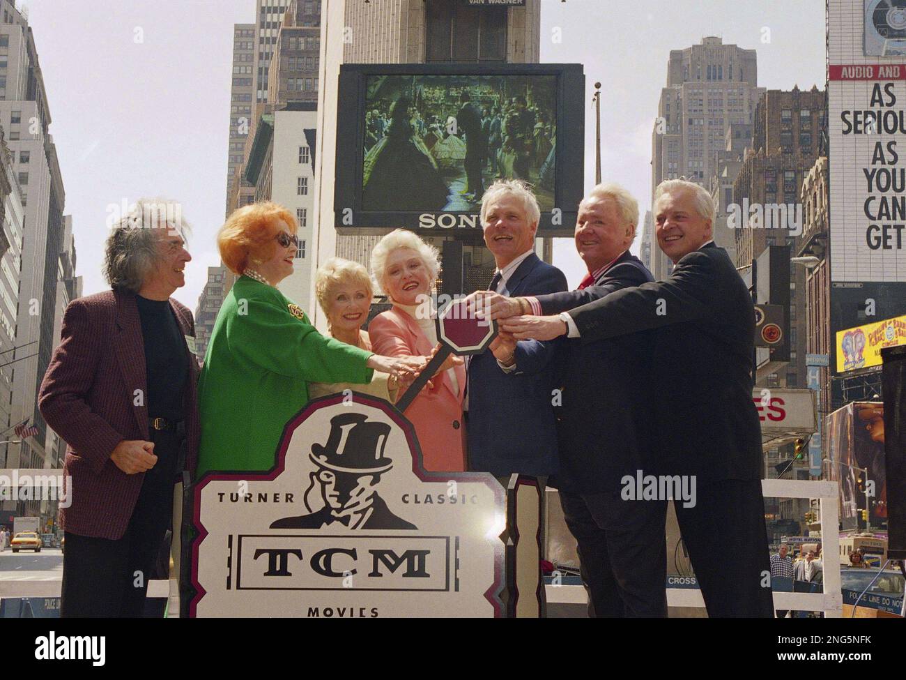 Communications mogul Ted Turner, third from right, poses with movie ...