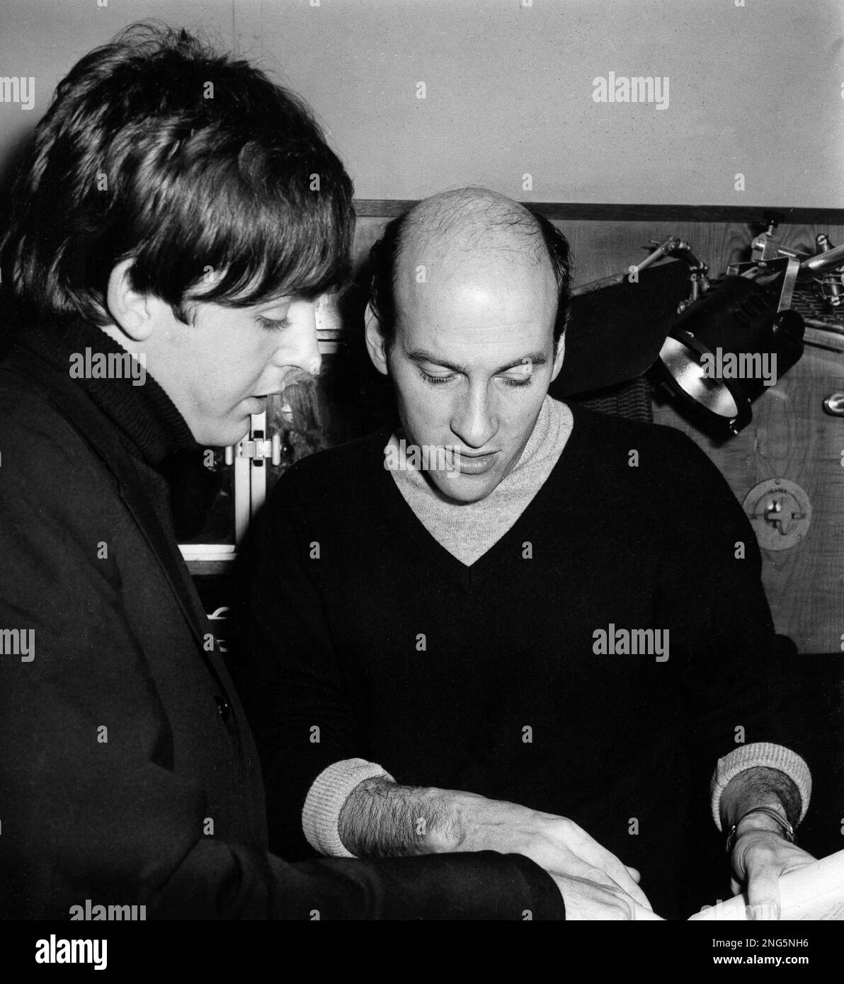 Director Richard "Dick" Lester goes over some script changes with ...