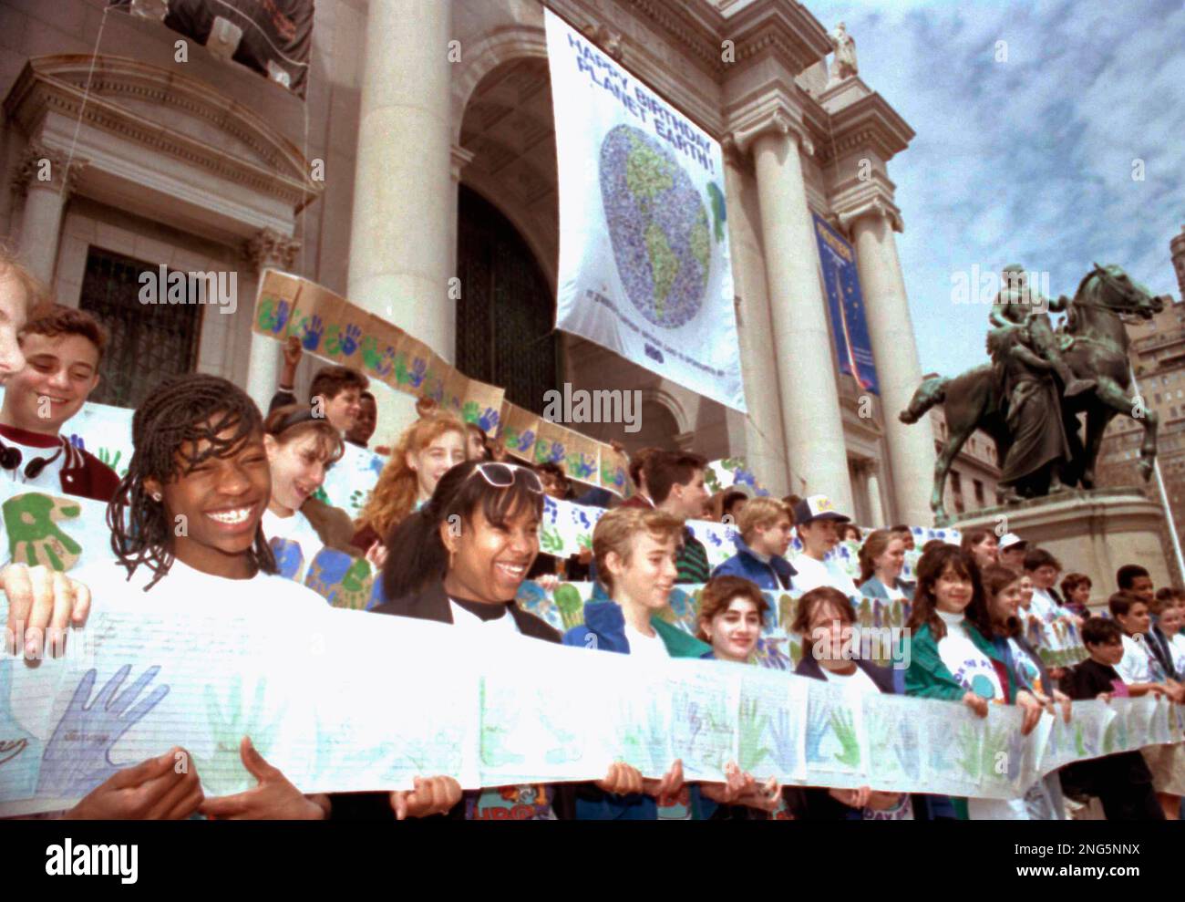 Children celebrate Earth Day in New York Friday, April 20,1990 as they ...