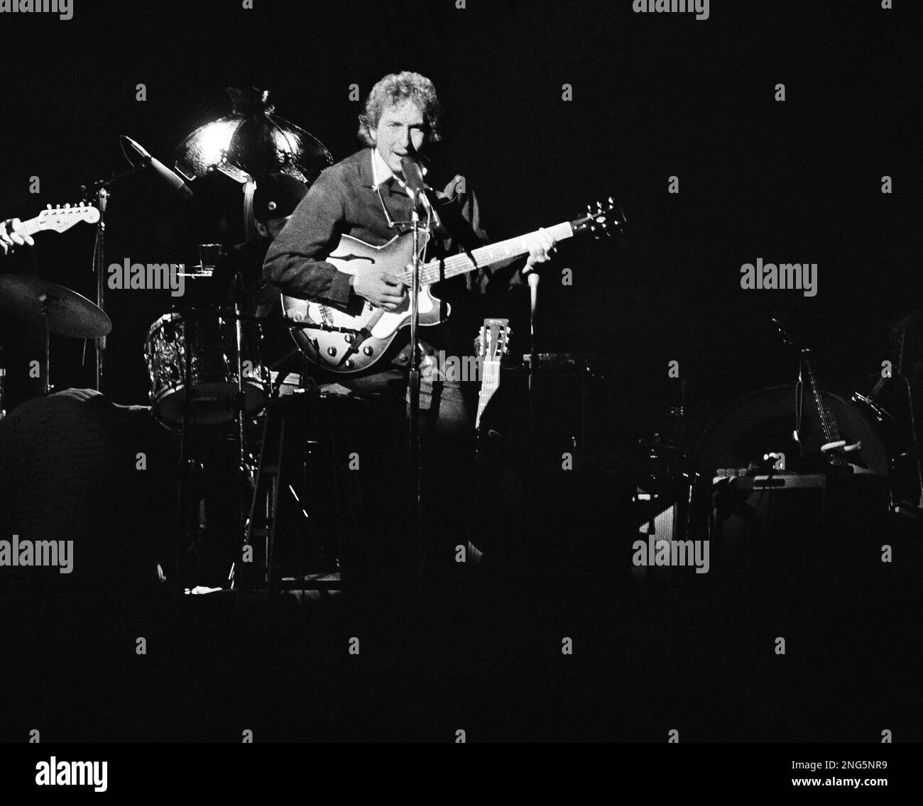 Bob Dylan performs with The Band at Chicago's Stadium, January 3, 1974 ...