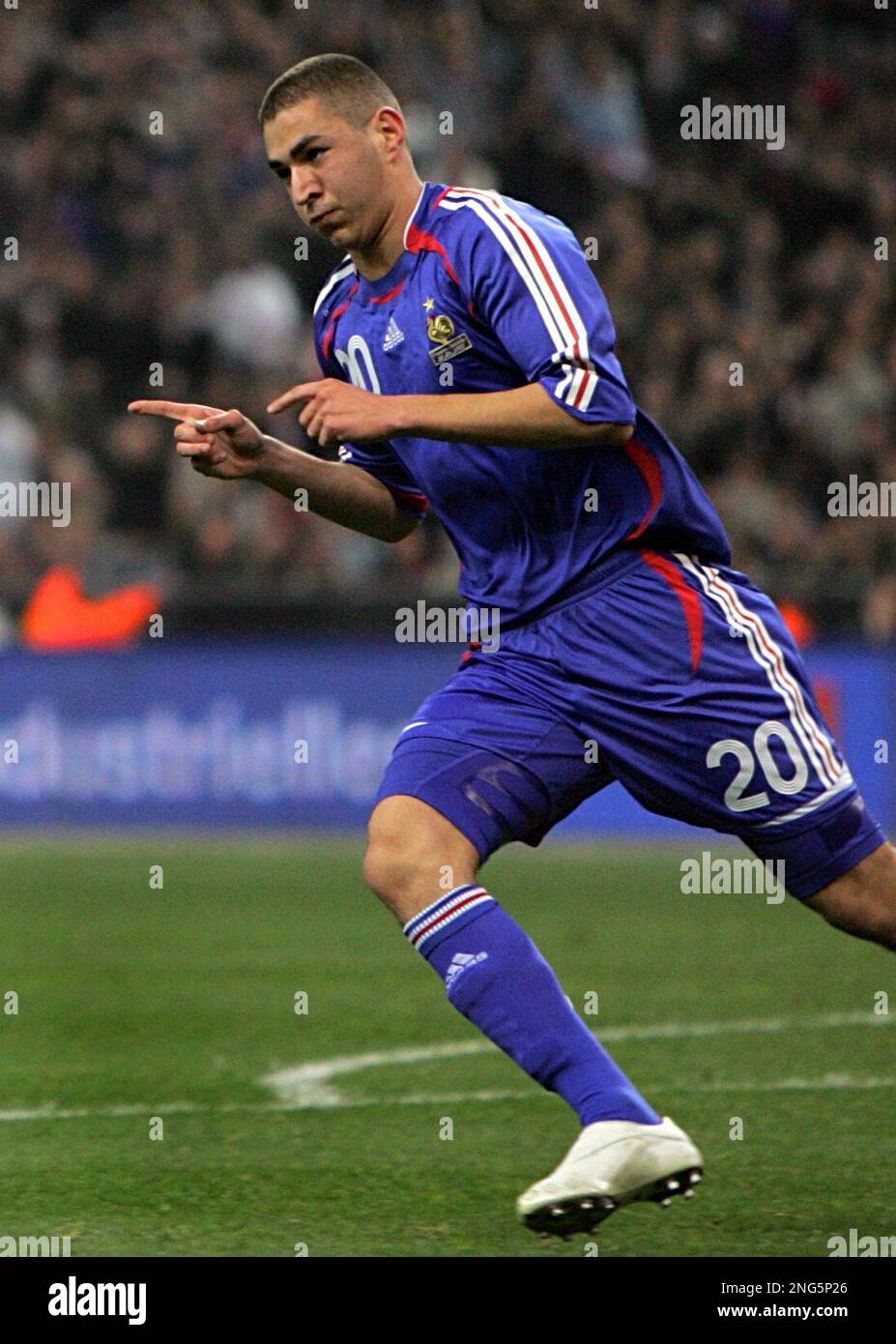 French player Karim Benzema reacts after scoring for France during the ...