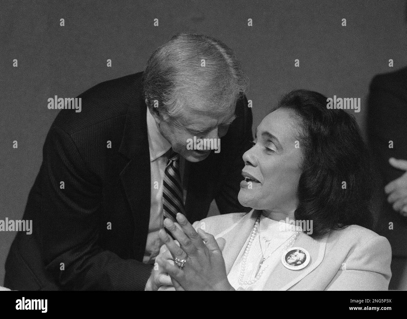 Former President Jimmy Carter confers with Coretta Scott King, widow of ...