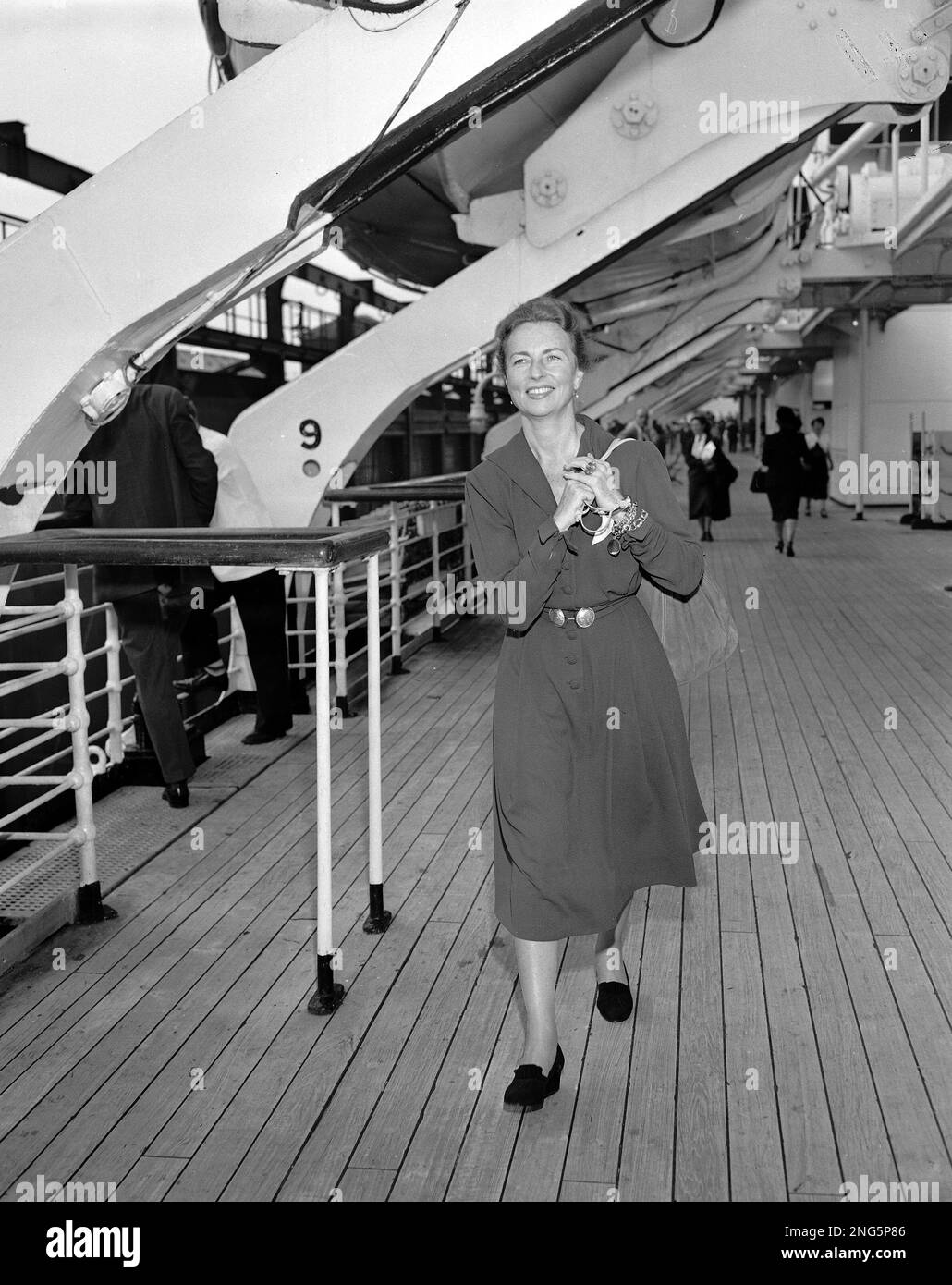 Actress Agnes Moorehead is seen walking on the deck of the Queen Mary ...