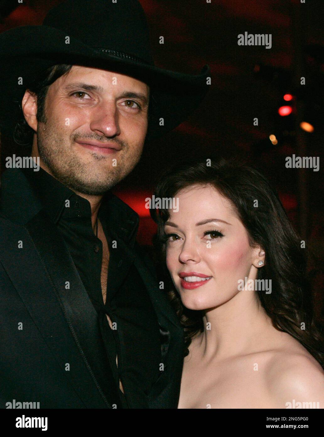 Director Robert Rodriguez, left, and Rose McGowan at the after party ...