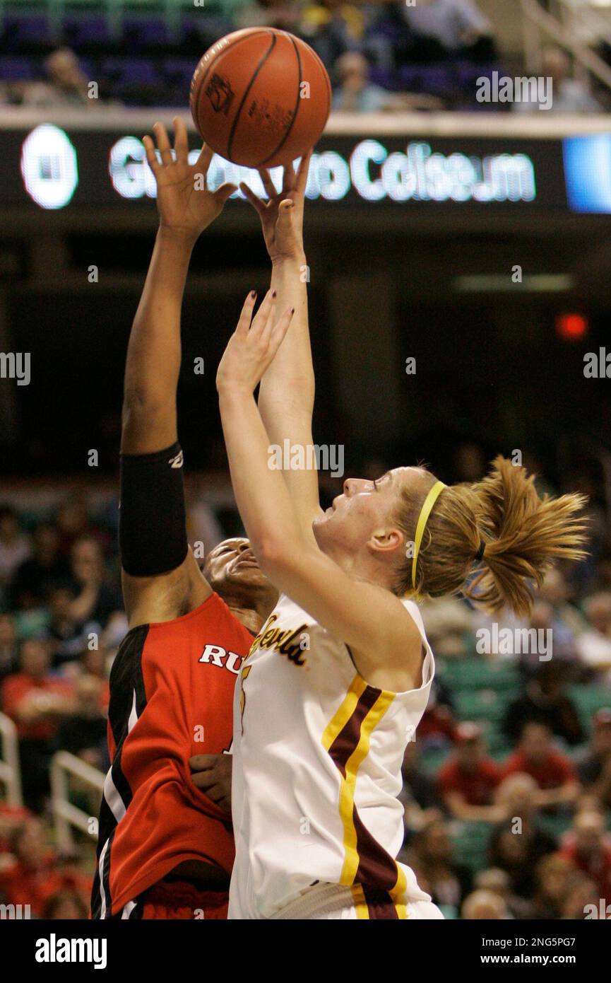 Arizona State's Aubree Johnson, right, tries to put up a shot past ...