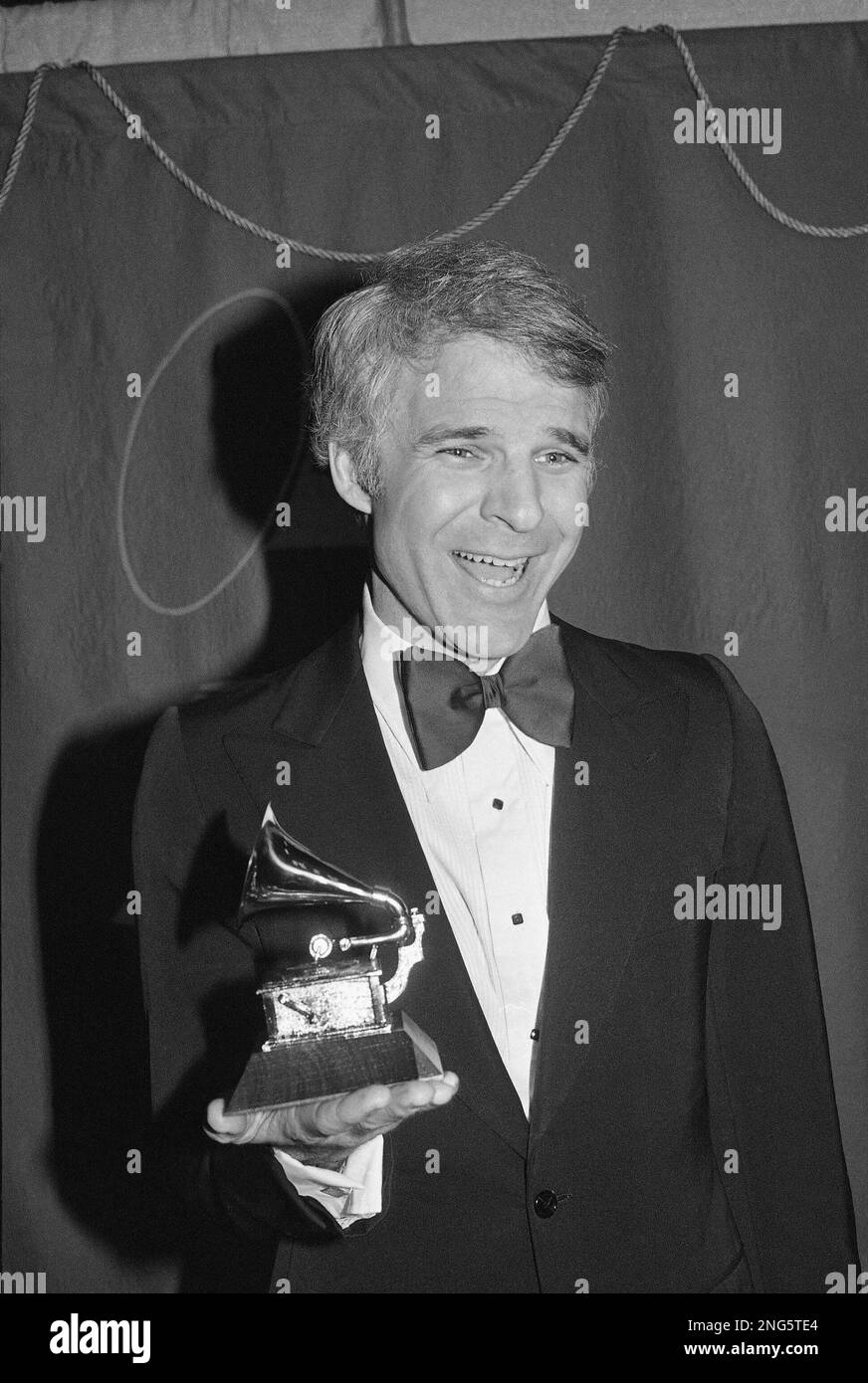 Comedian Steve Martin holds his Grammy Awards presented to him Feb 16 ...