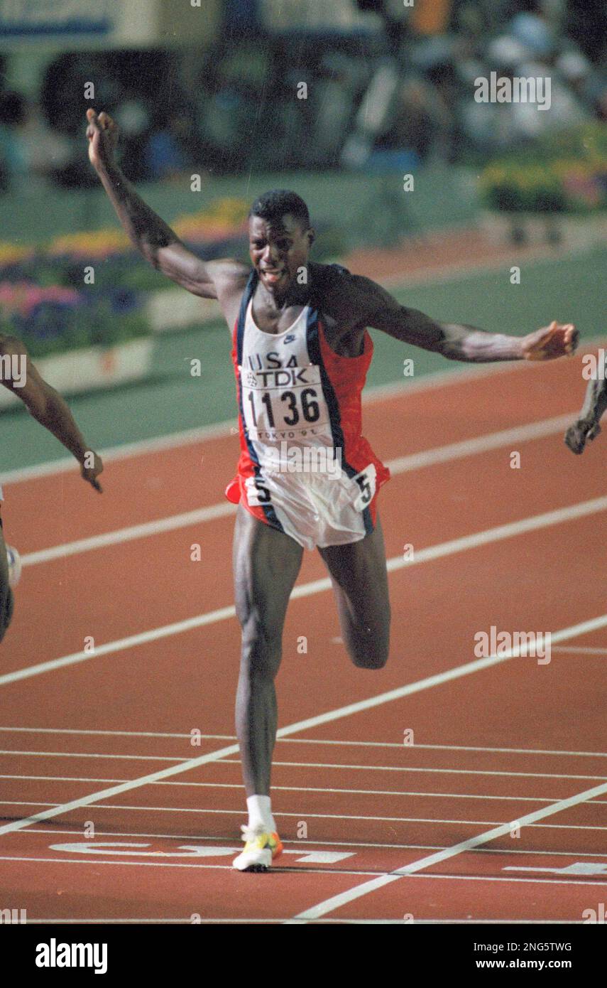 Carl Lewis of the United States crosses the finish line winning the 100 ...