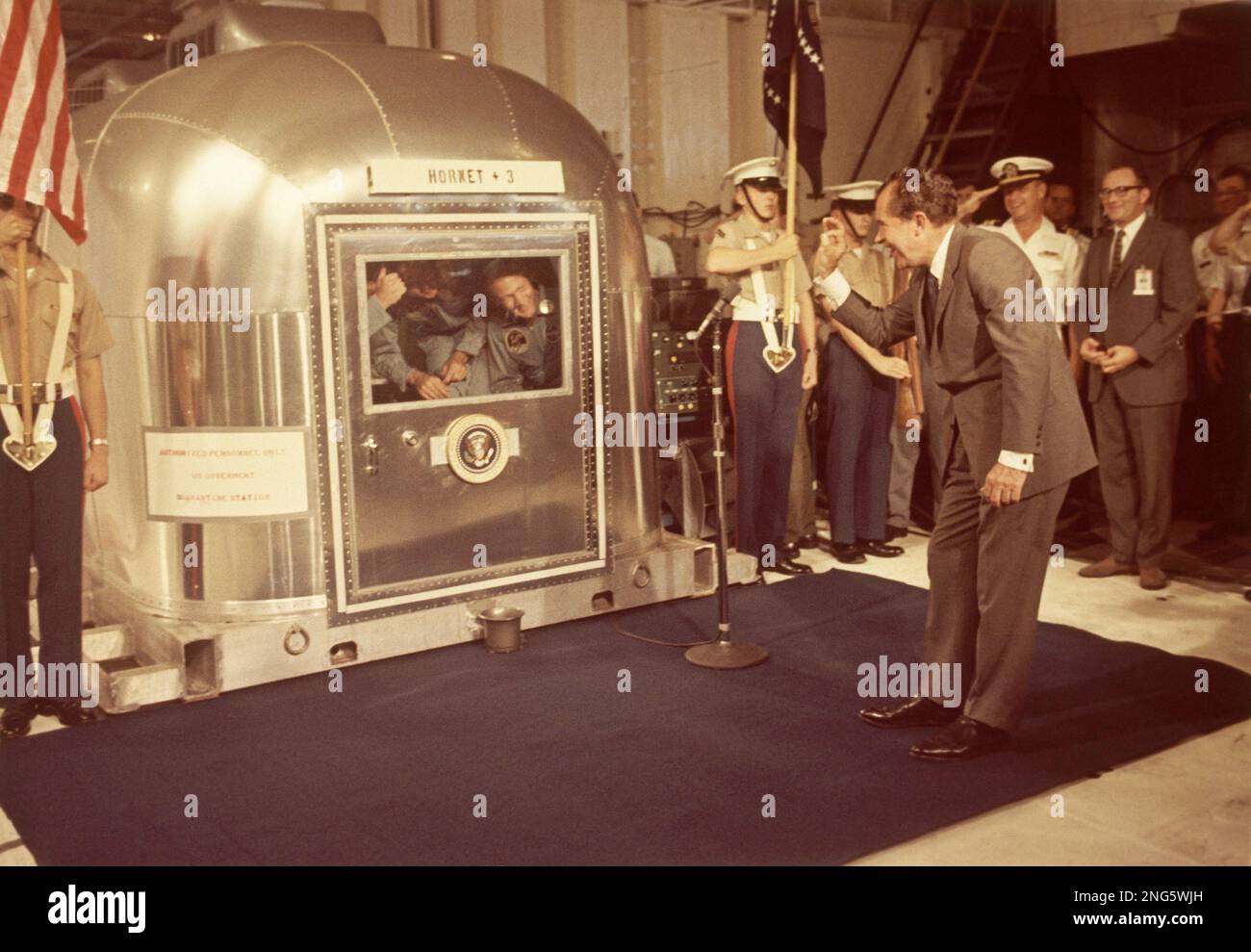 President Richard Nixon gives the "ok" sign to the Apollo 11 astronauts ...