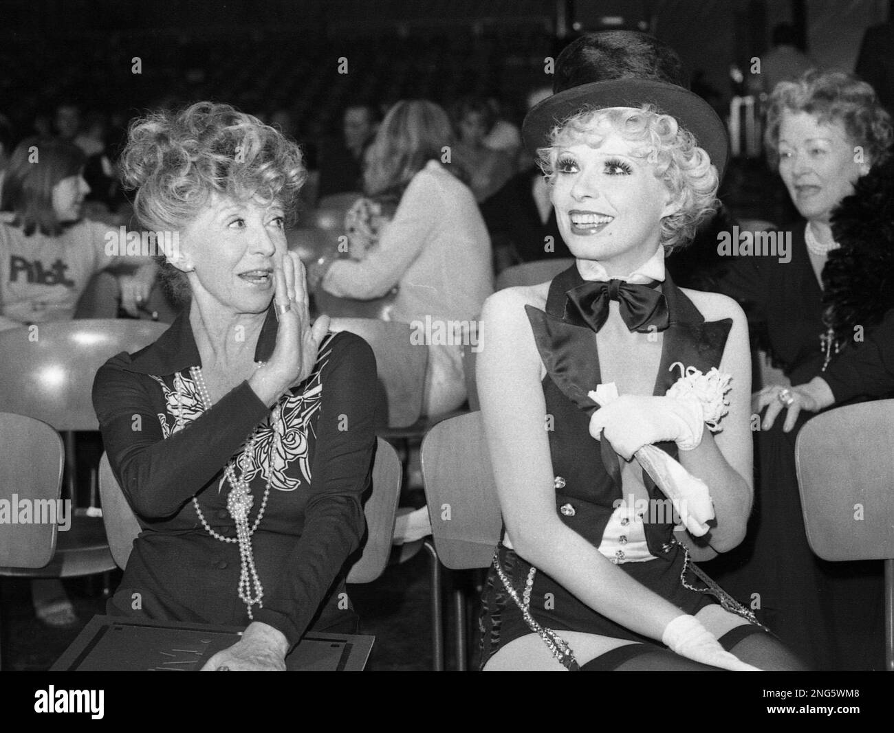 German starlet and actress Ingrid Steeger, right, smiles as German ...