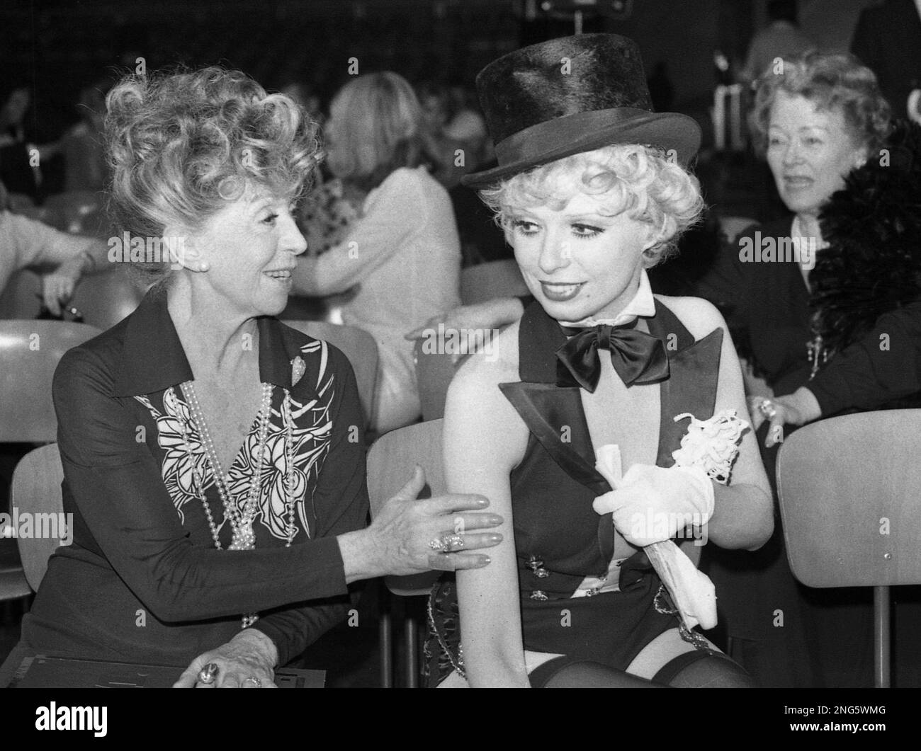 German starlet and actress Ingrid Steeger, right is touched on the arm ...