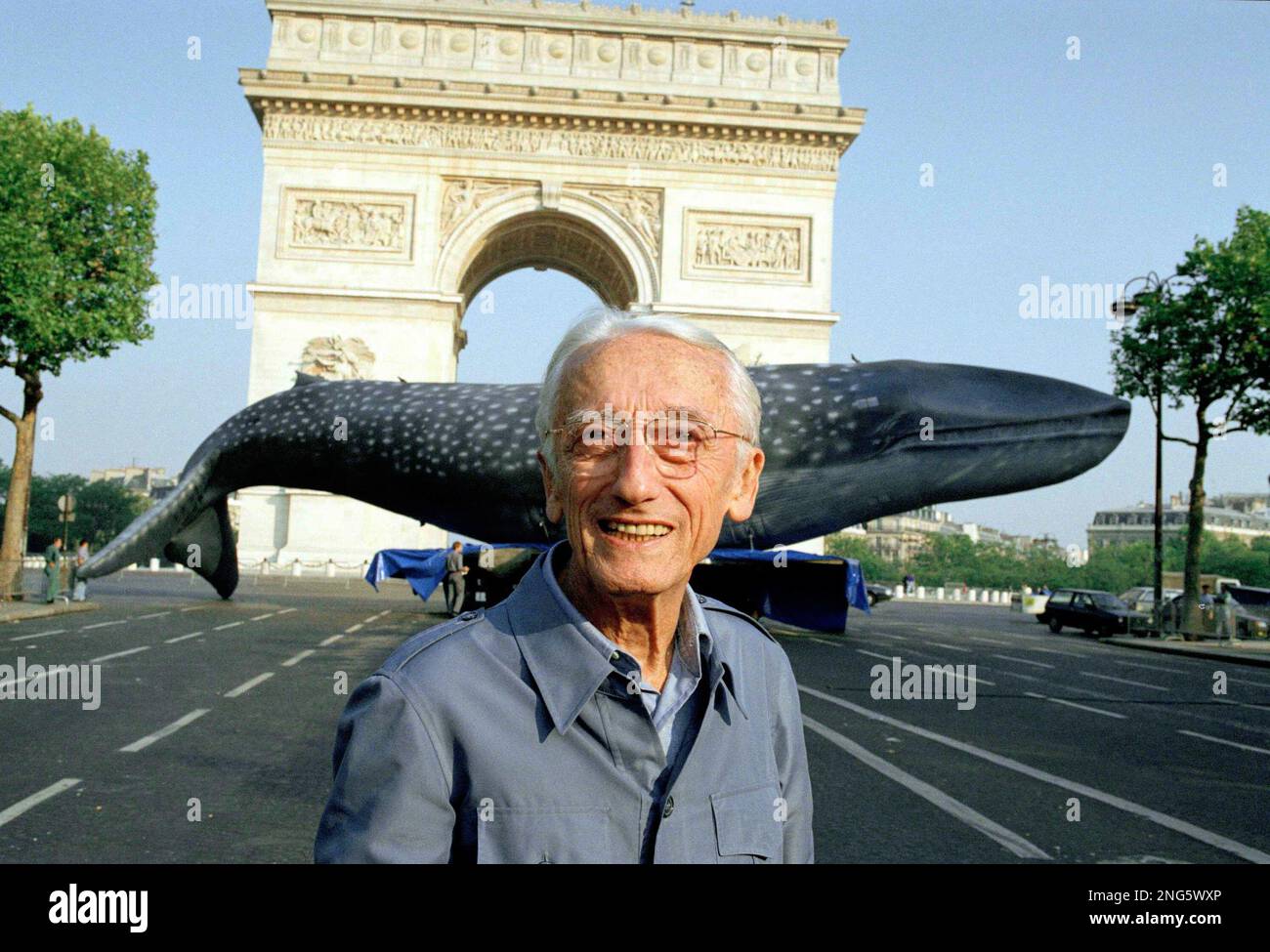 French oceanographer and explorer Jacques Cousteau poses in front of a ...