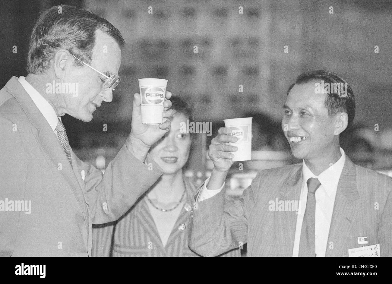U.S. Vice President George Bush toasts in Pepsi- Cola with He Yao ...