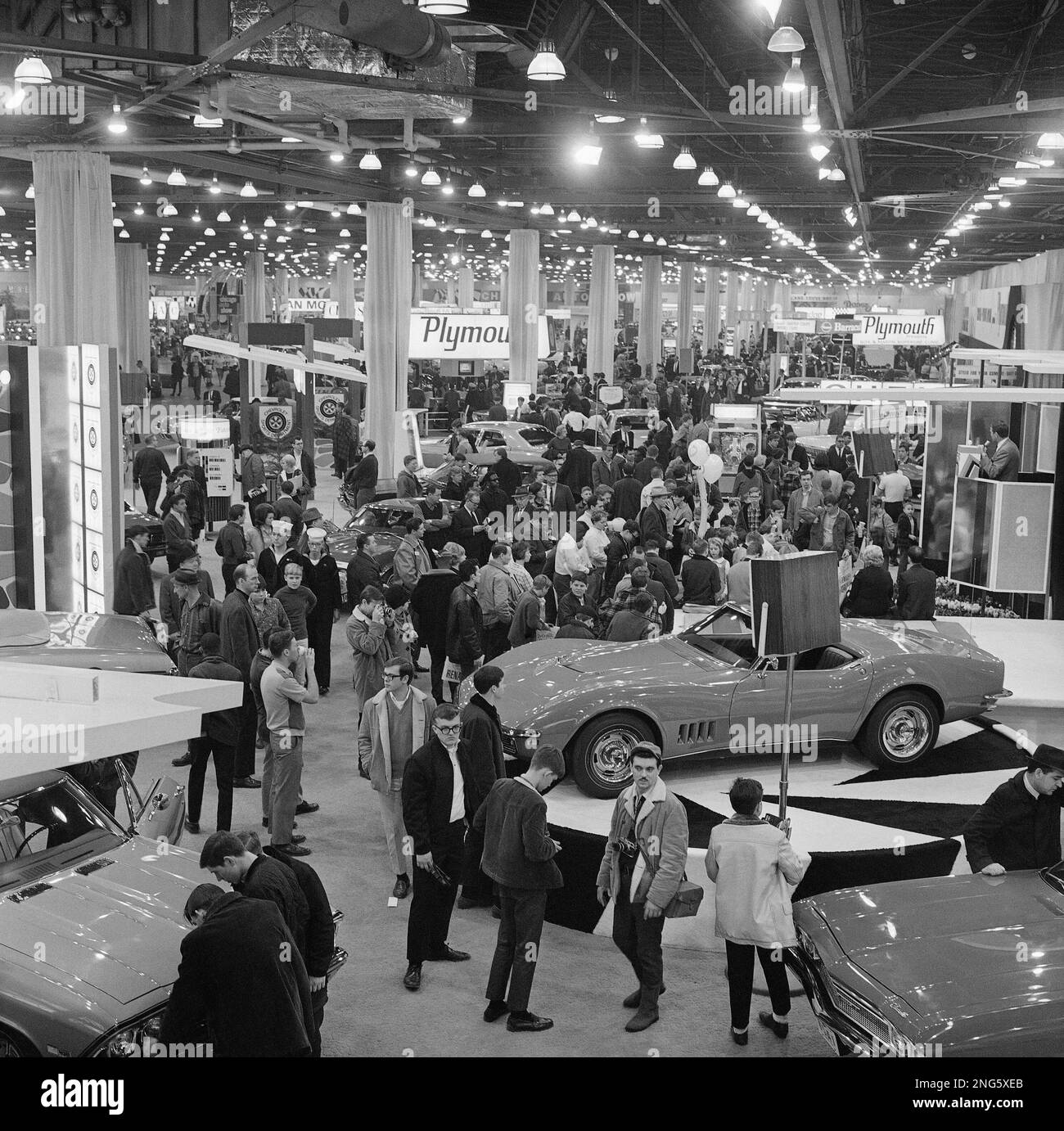 A Crowd of early arrivals mill about at the opening of the 1968 Chicago ...