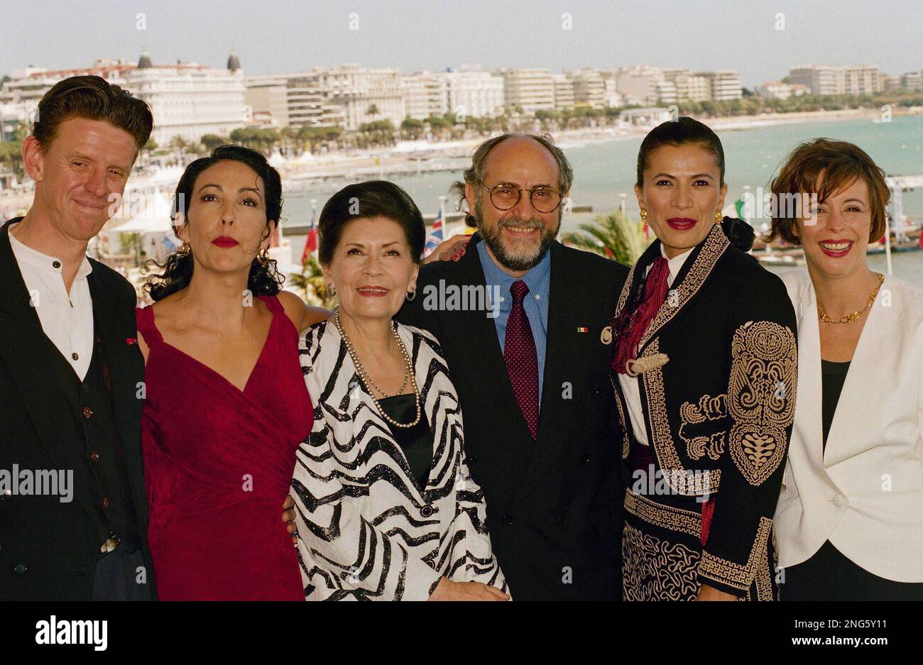 Mexican film director, Arturo Ripstein, center, poses with his actors ...