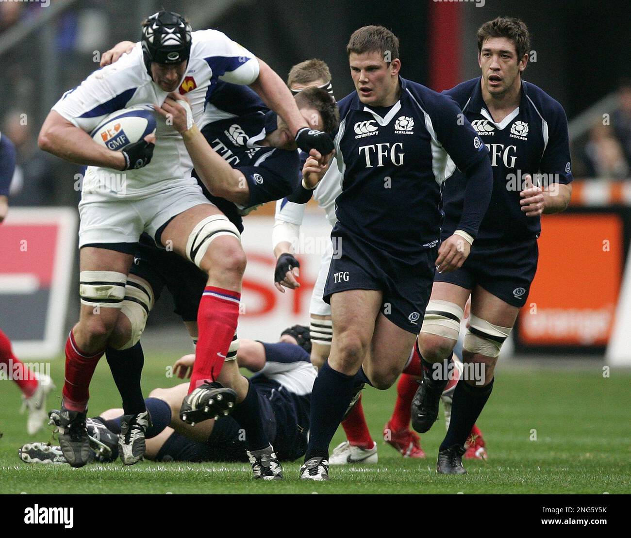 France's Jerome Thion finds his way through Scotland's defence as Nikki ...